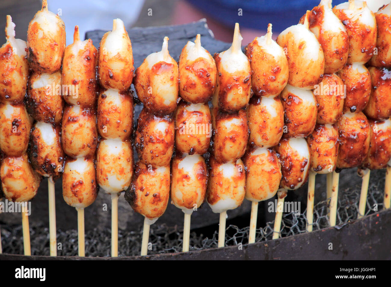 Yaki Dango Grilled Skewered Rice Dumpling in front of a Restaurant at ...
