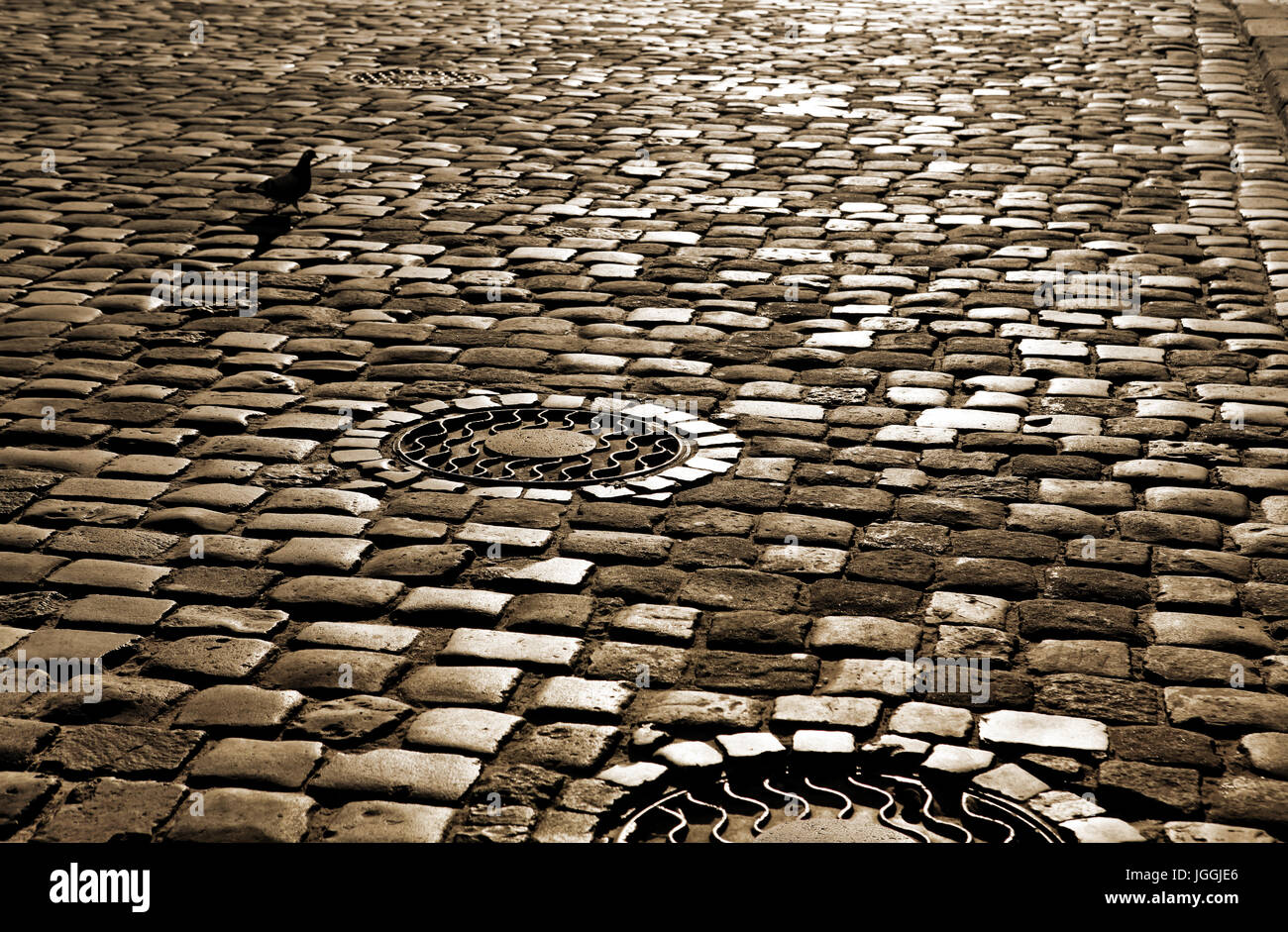 ancient road with paved stone blocks at night Stock Photo - Alamy