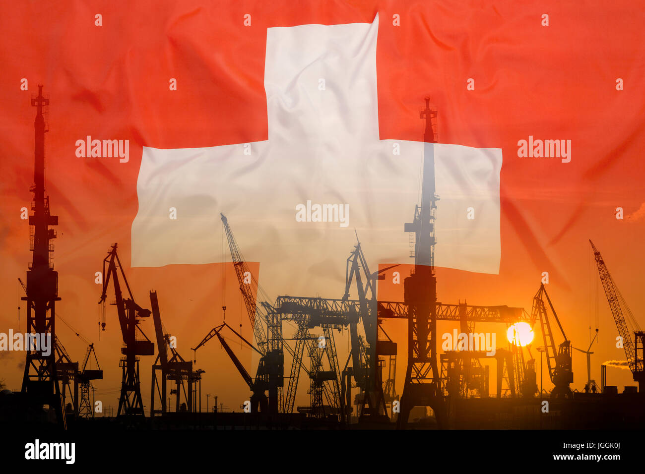 Industrial concept with Switzerland flag at sunset, silhouette of ...