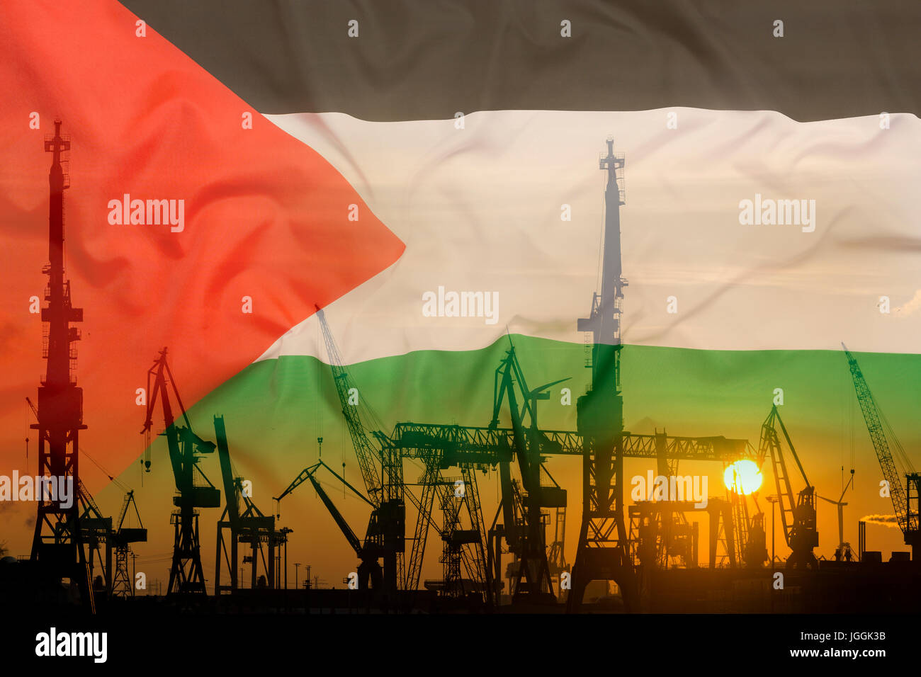 Industrial concept with Palestine flag at sunset, silhouette of ...