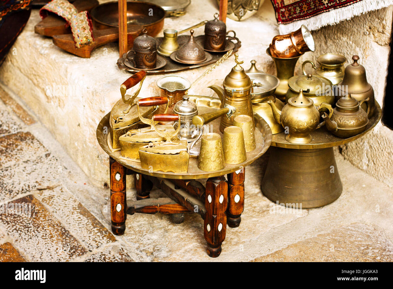 Metal authentic dishware at turkish bazaar, coffee set Stock Photo - Alamy