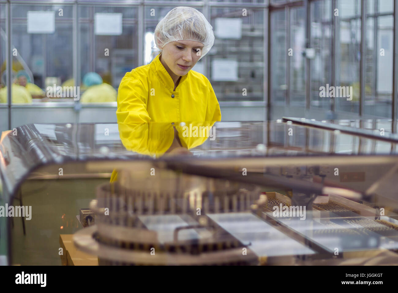 Lab technician working inside a pharmaceutical factory Stock Photo - Alamy
