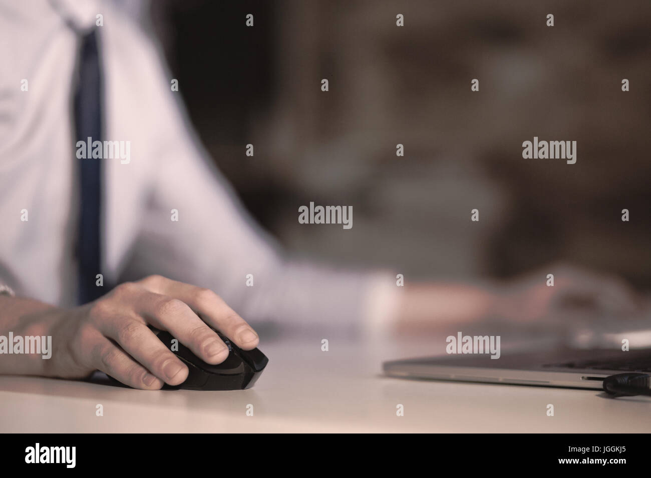 Hand using computer mouse at office closeup Stock Photo - Alamy