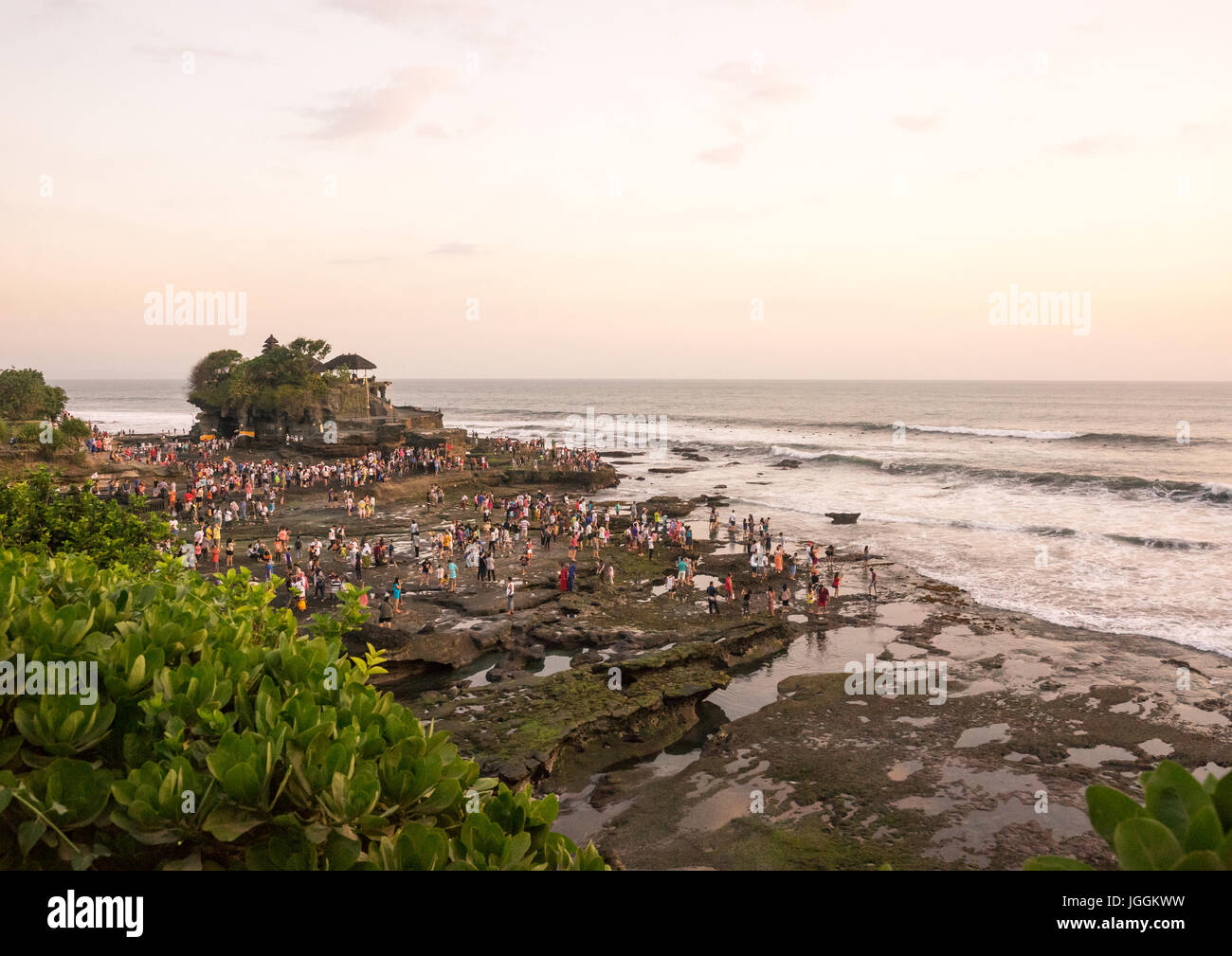 Tourists at the temple Pura Tanah Lot, Bali island, Tabanan, Indonesia ...