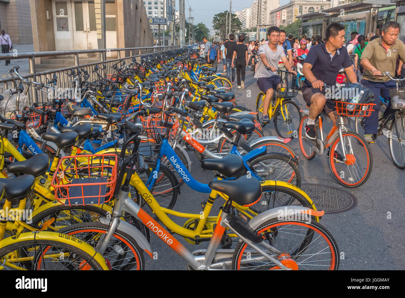People ride shared bikes in Beijing, China. 07-Jul-2017 Stock Photo - Alamy