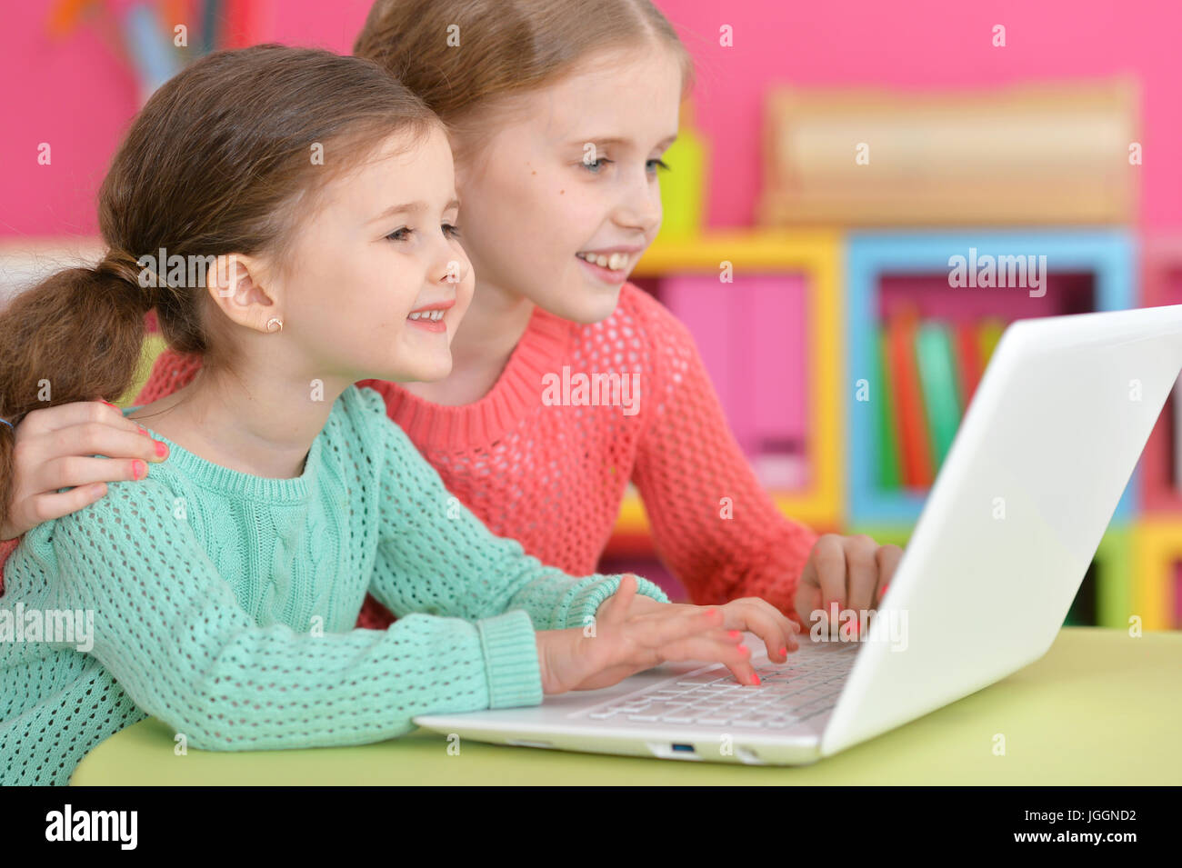 Two girls playing game Stock Photo - Alamy
