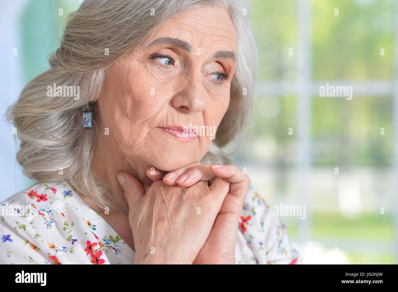sad senior woman Stock Photo - Alamy