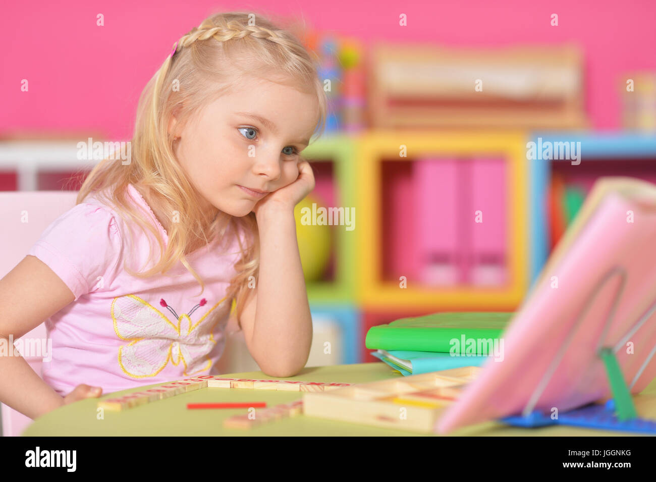 cute girl reading book Stock Photo - Alamy