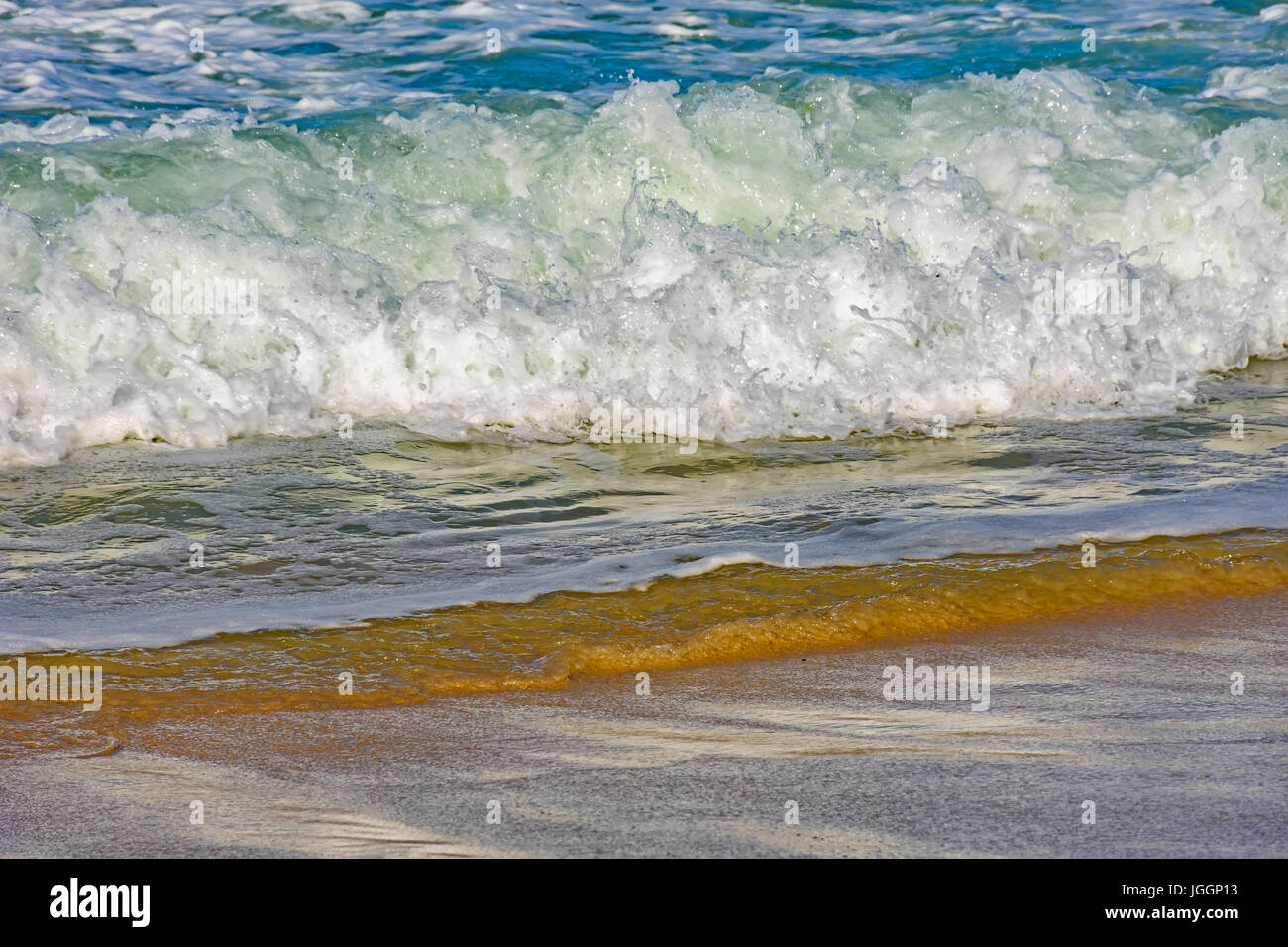 Foam over sand hi-res stock photography and images - Alamy