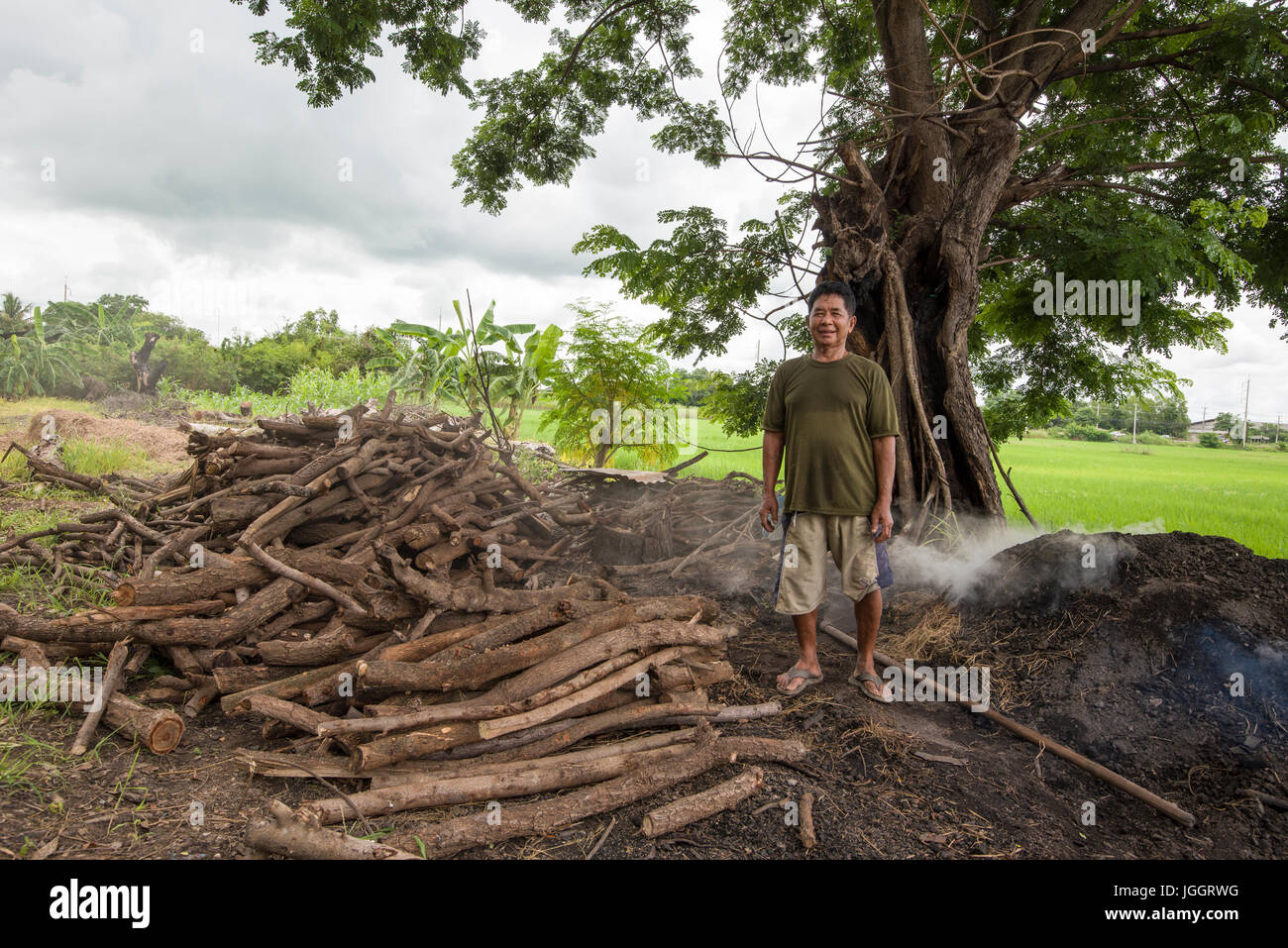 Charcoal making in Thailand Stock Photo - Alamy