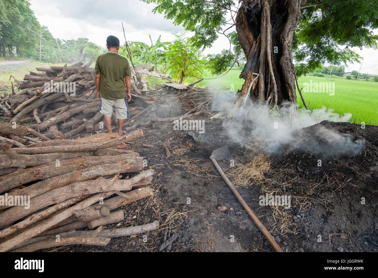 Charcoal making in Thailand Stock Photo - Alamy