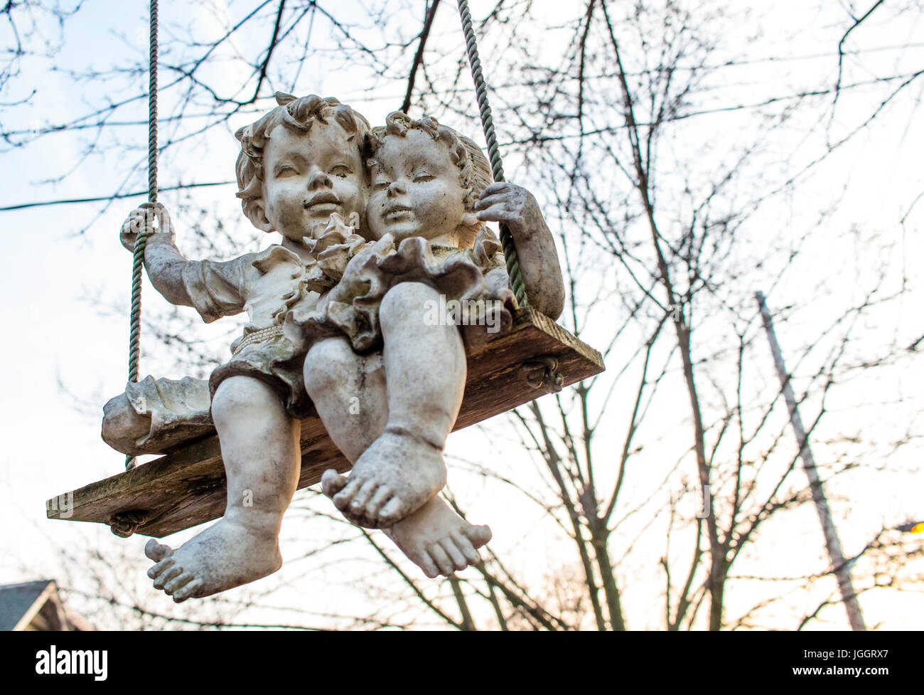 Romantic couple on swing cute hi-res stock photography and images - Alamy