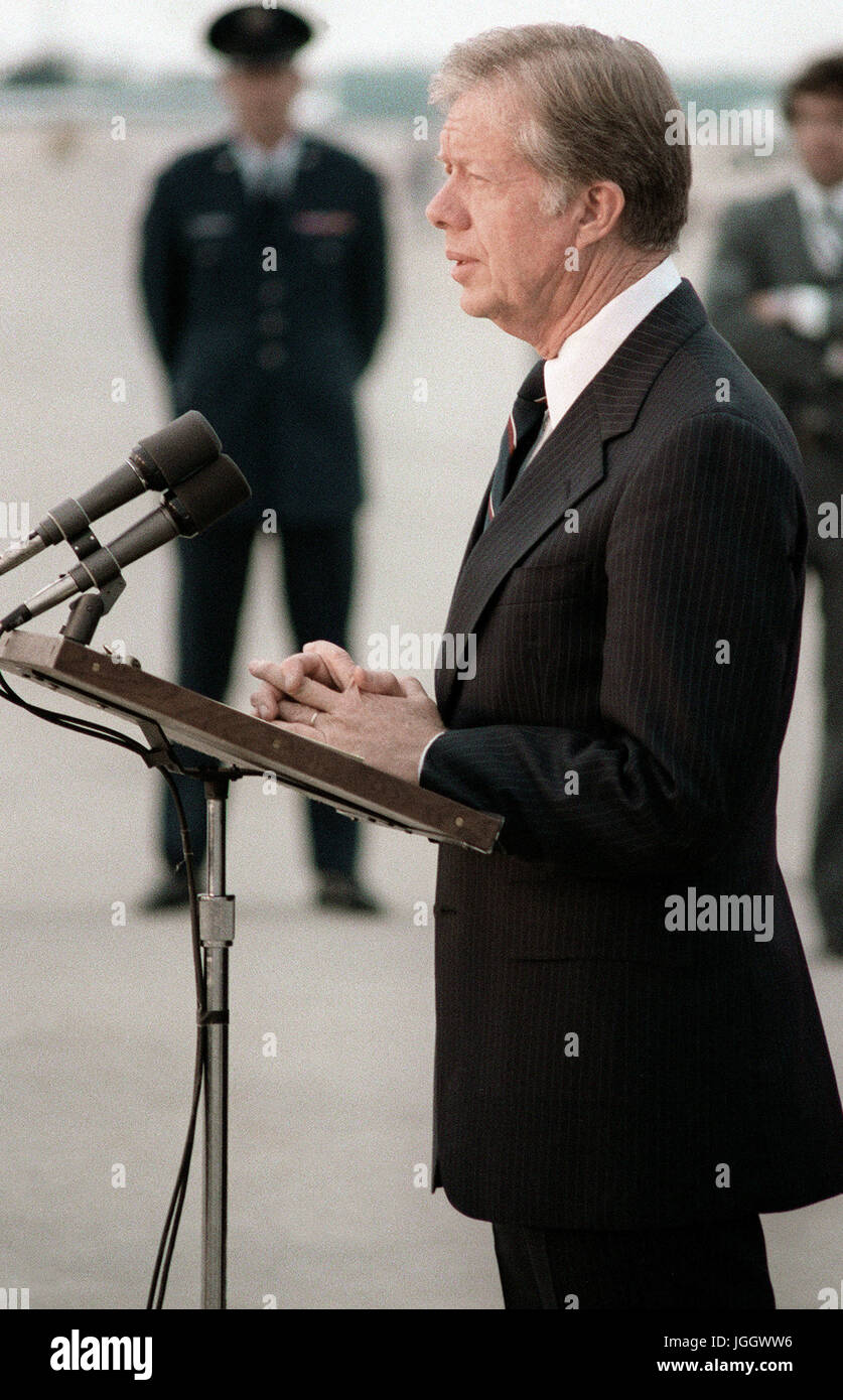 President Jimmy Carter speaks to a crowd upon his return from his ...