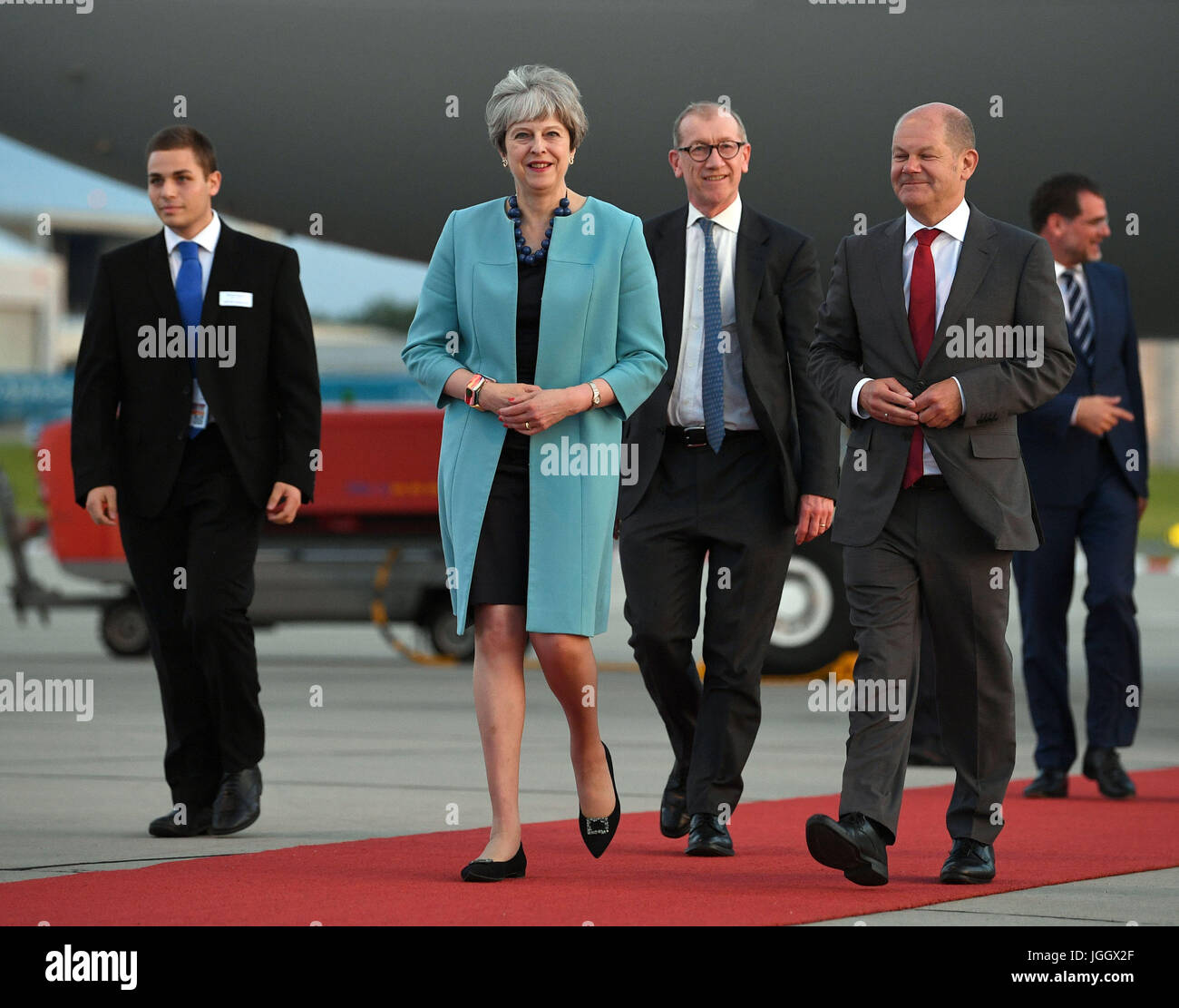 Prime Minister Theresa May and husband Philip arrive in Hamburg for the ...