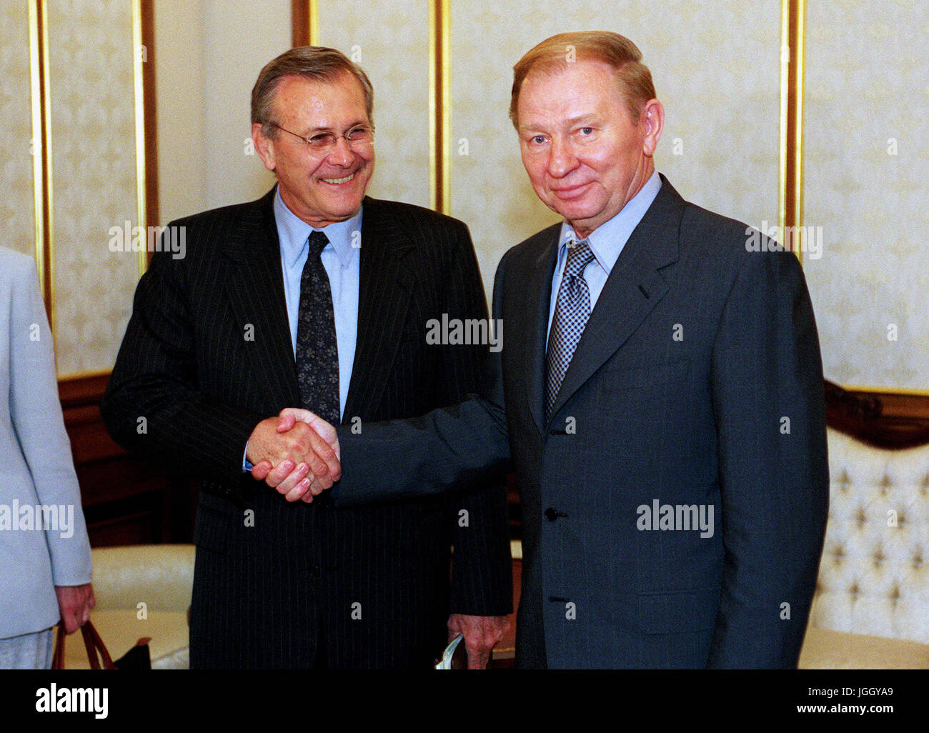 The Honorable Donald H. Rumsfeld (left), U.S. Secretary of Defense, and ...