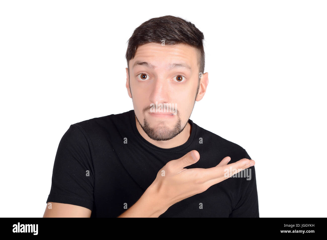 Portrait Of A Young Man Showing Something Isolated White Background