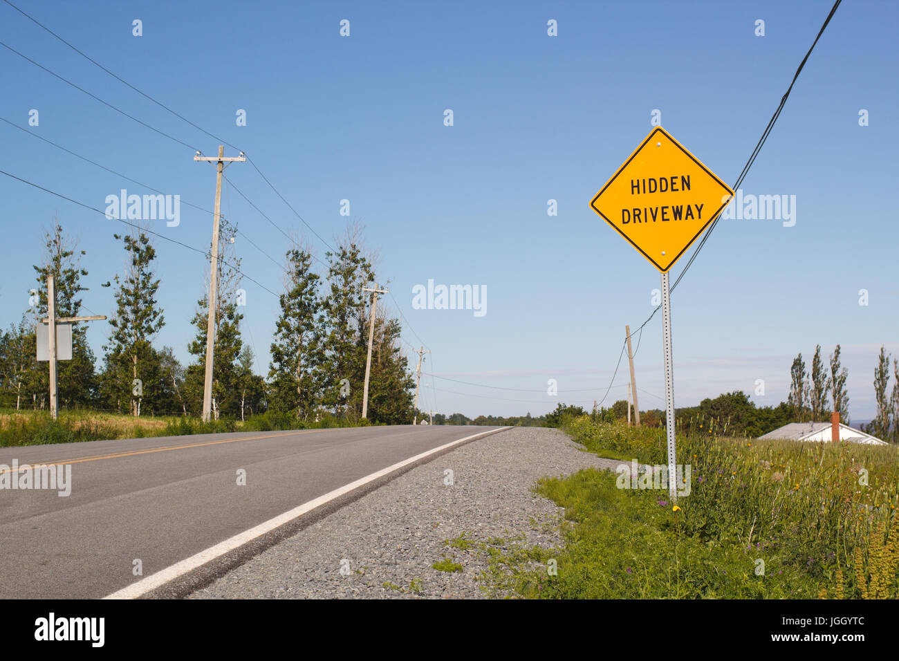 Traffic sign hidden hi-res stock photography and images - Alamy