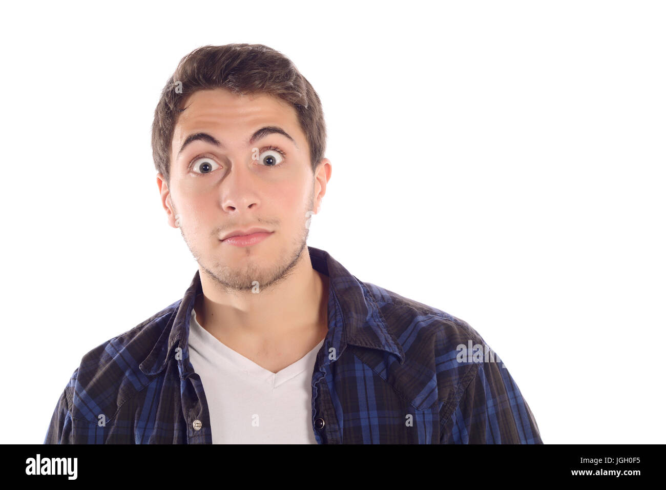 Portrait of a young amazed man. Isolated white background Stock Photo ...