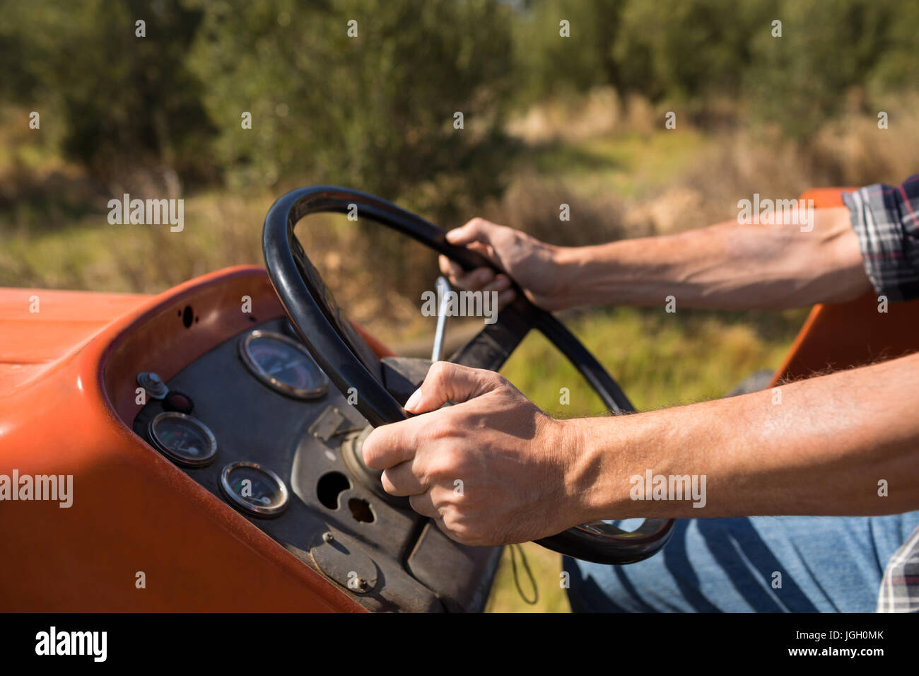 Man driving tractor hi-res stock photography and images - Alamy