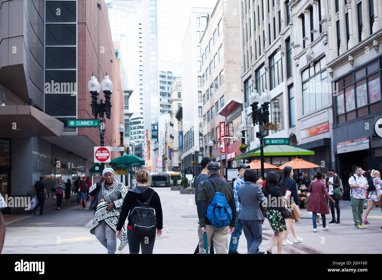 Busy corner of Winter and Summer Streets in Downtown Crossing in Boston ...