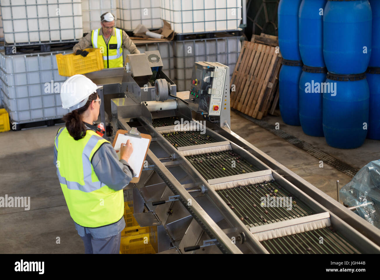 Senior man holding oil container hi-res stock photography and images ...