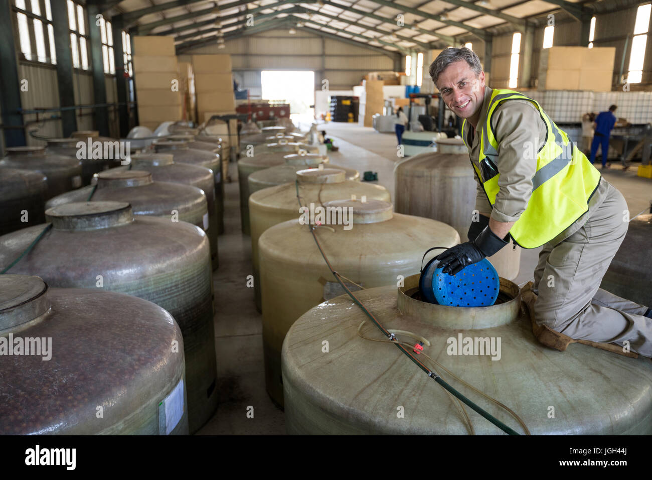 Oil tank worker hi-res stock photography and images - Alamy