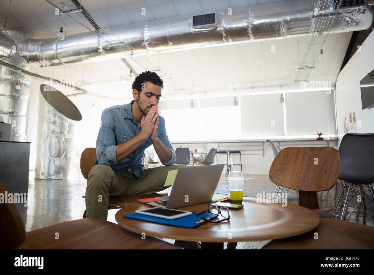 Tired man sitting on chair hi-res stock photography and images - Alamy