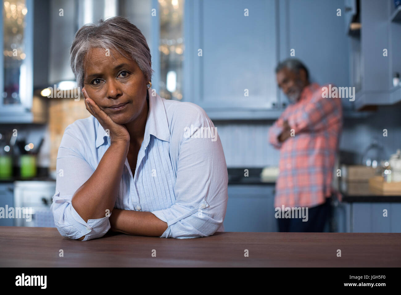 Senior citizen male leaning on table hi-res stock photography and ...