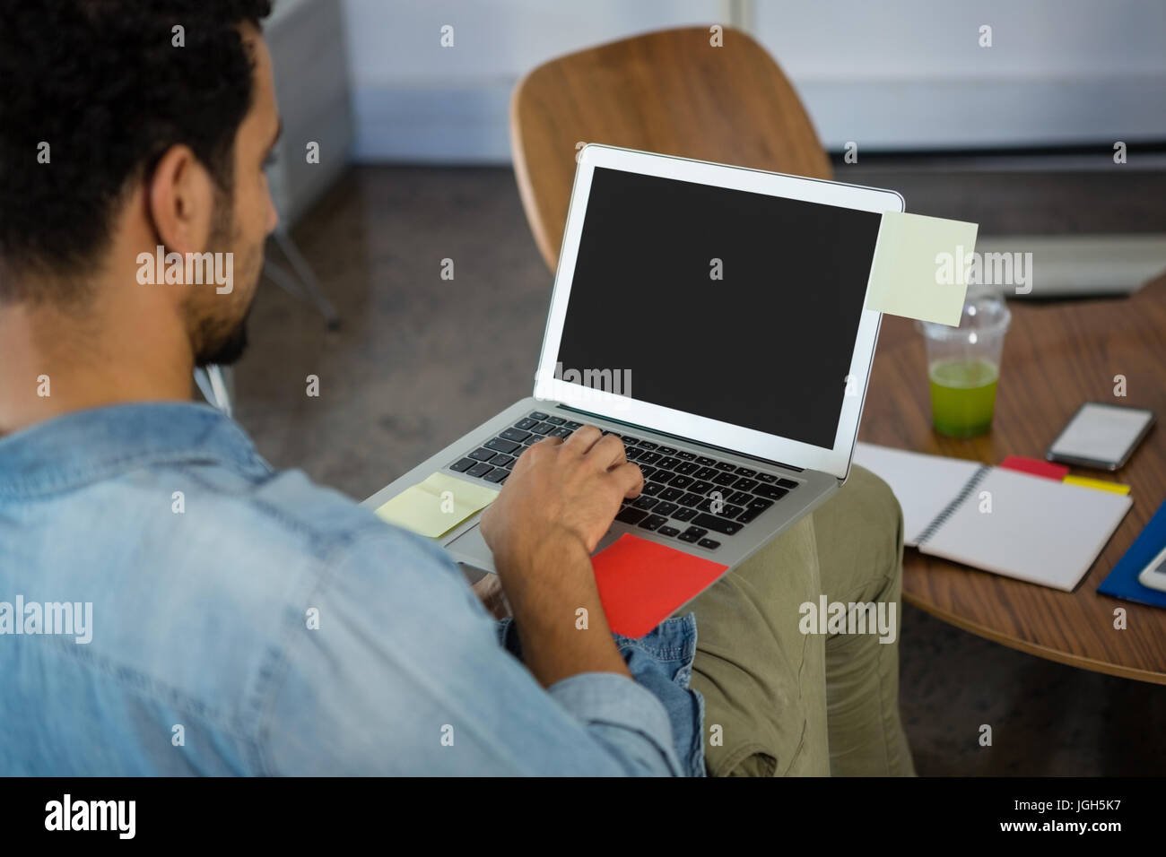 Man laptop office chair legs hi-res stock photography and images - Alamy