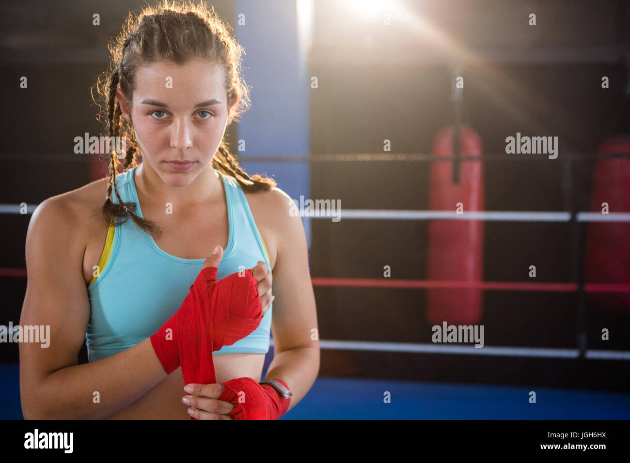 Woman wrapping hand boxing training hi-res stock photography and images ...