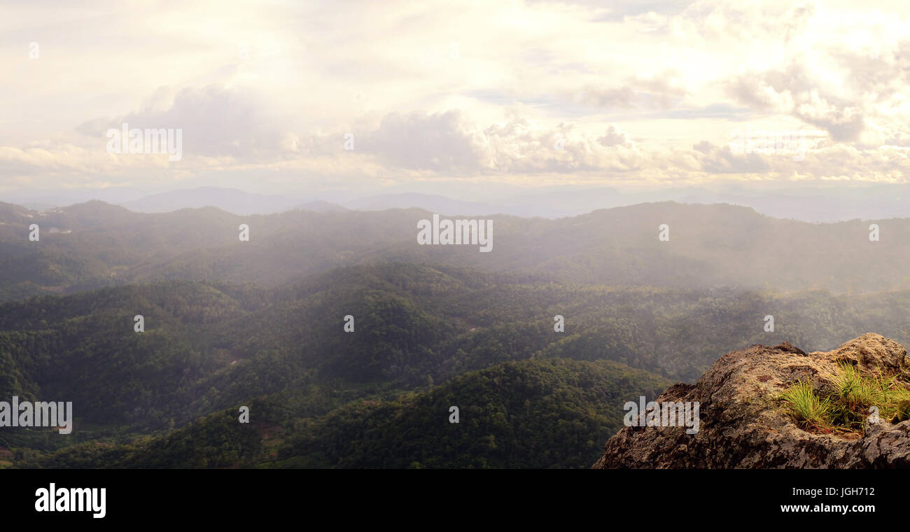 View of the mountains that glow under sunlight. Dramatic morning scene ...