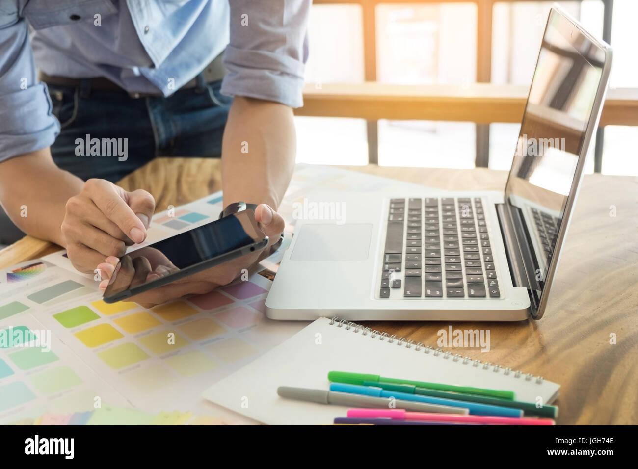 Hands of female hipster modern graphic designer in office working with ...
