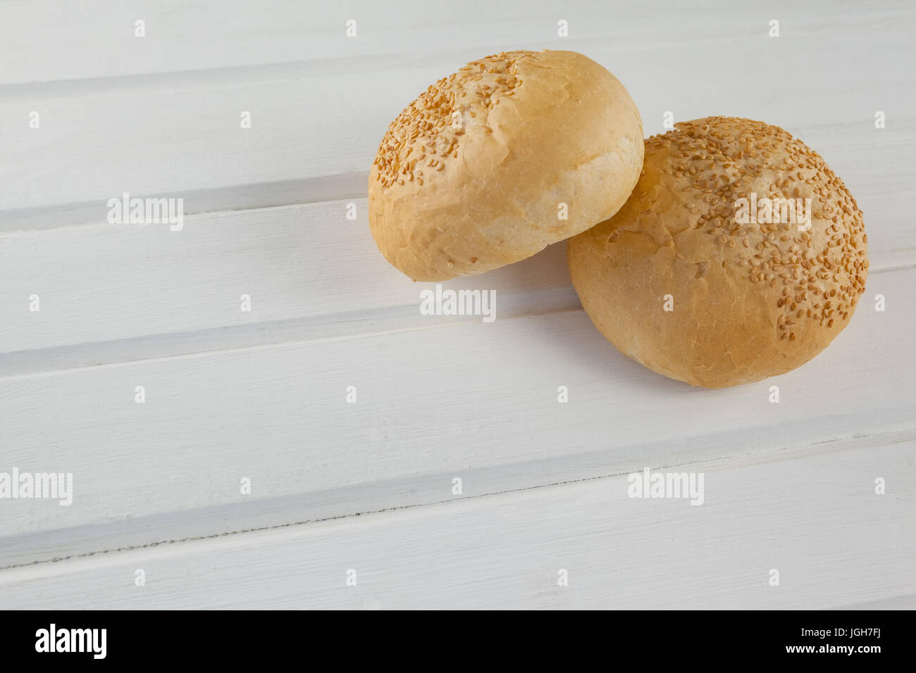 Two buns hi-res stock photography and images - Alamy