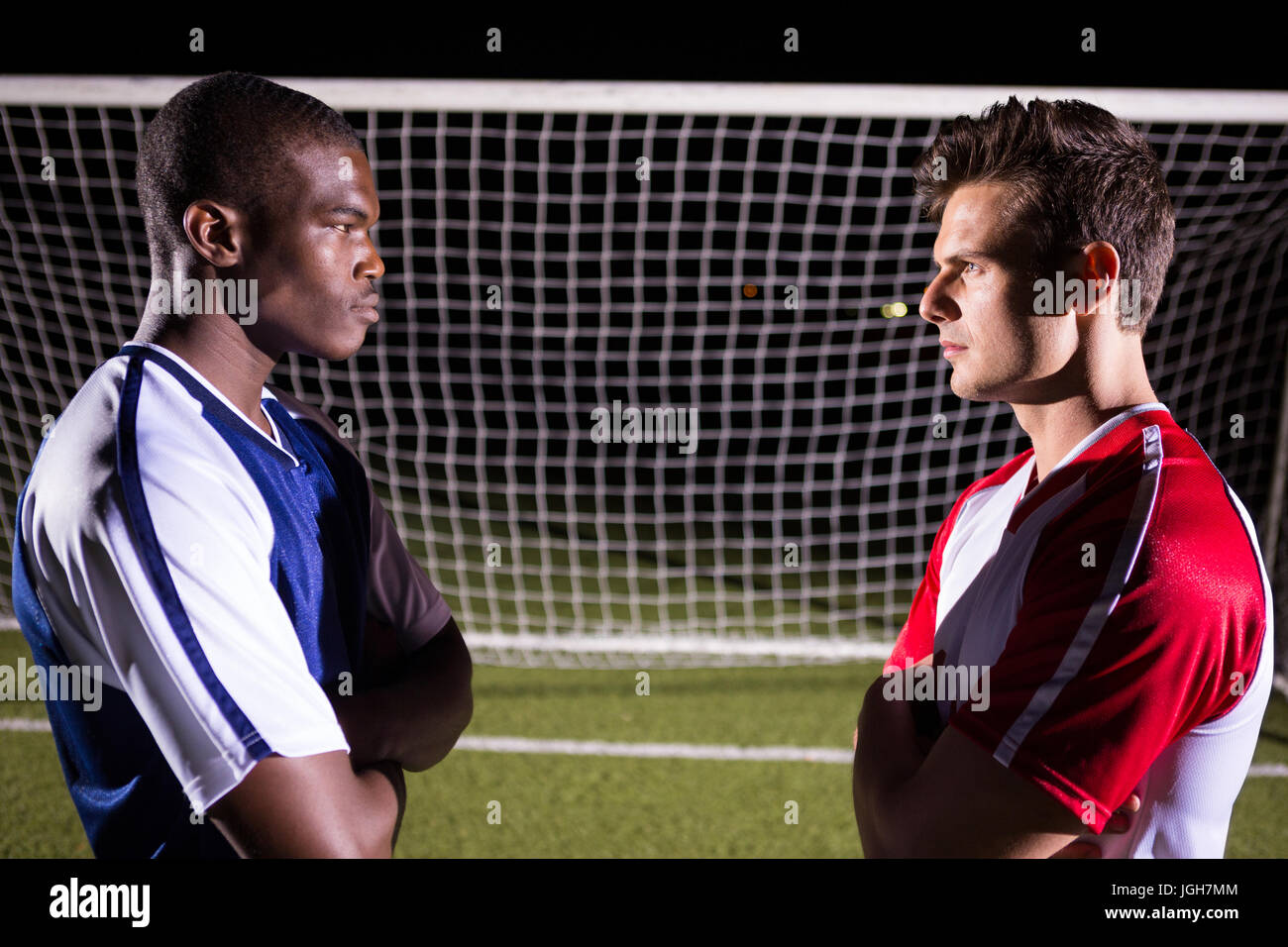 Professional sportsperson communication looking down smiling standing ...