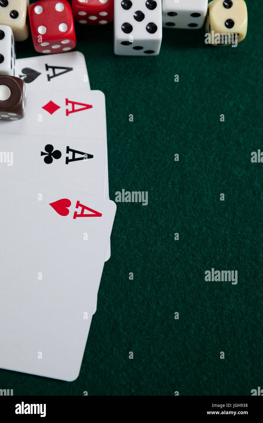 Playing cards on poker table hi-res stock photography and images - Alamy