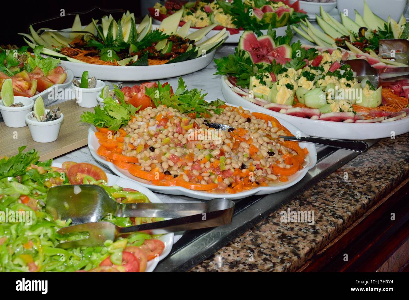 Large Plates of Salad in buffet Stock Photo - Alamy