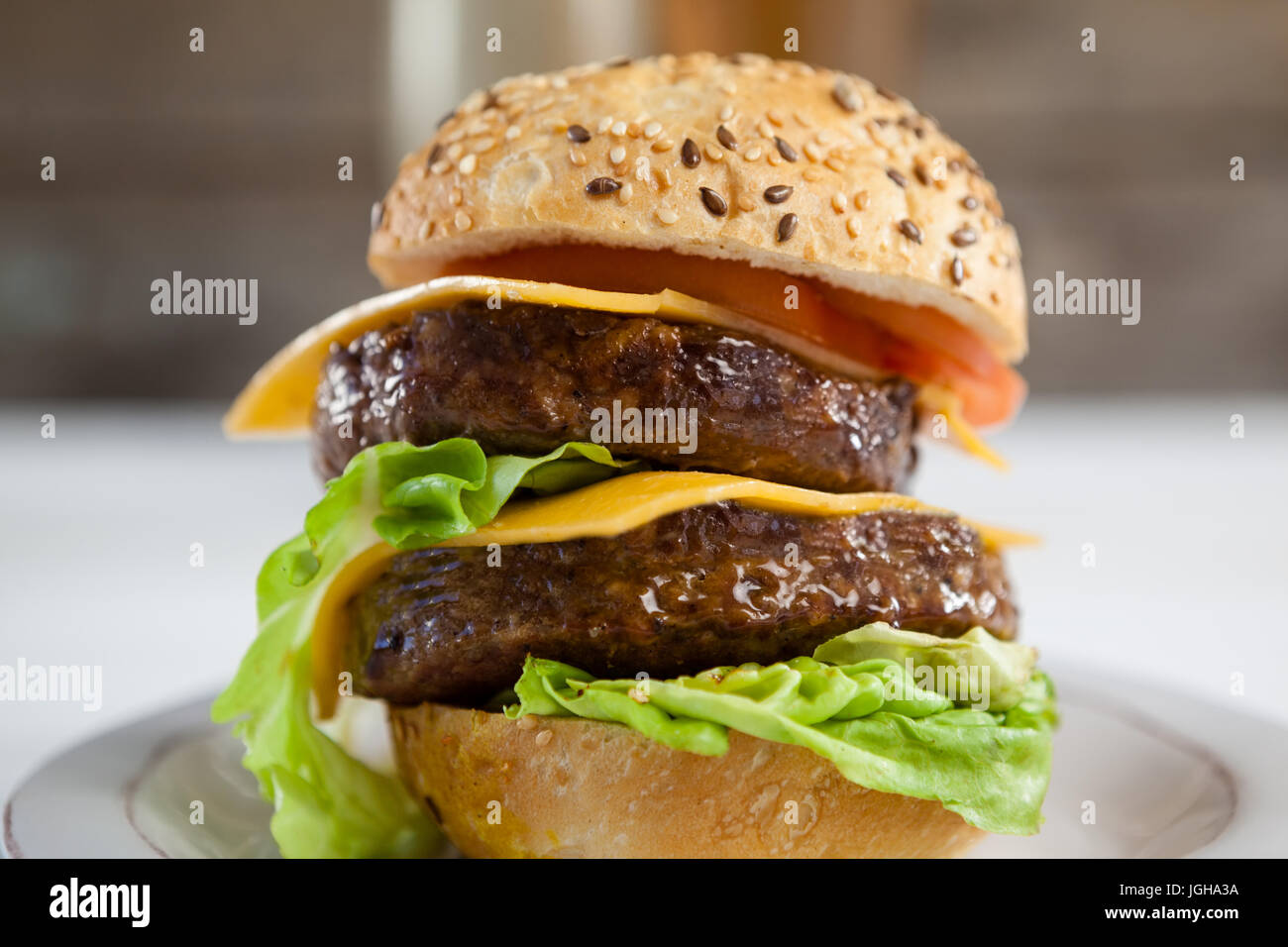 Close-up of hamburger in plate Stock Photo - Alamy