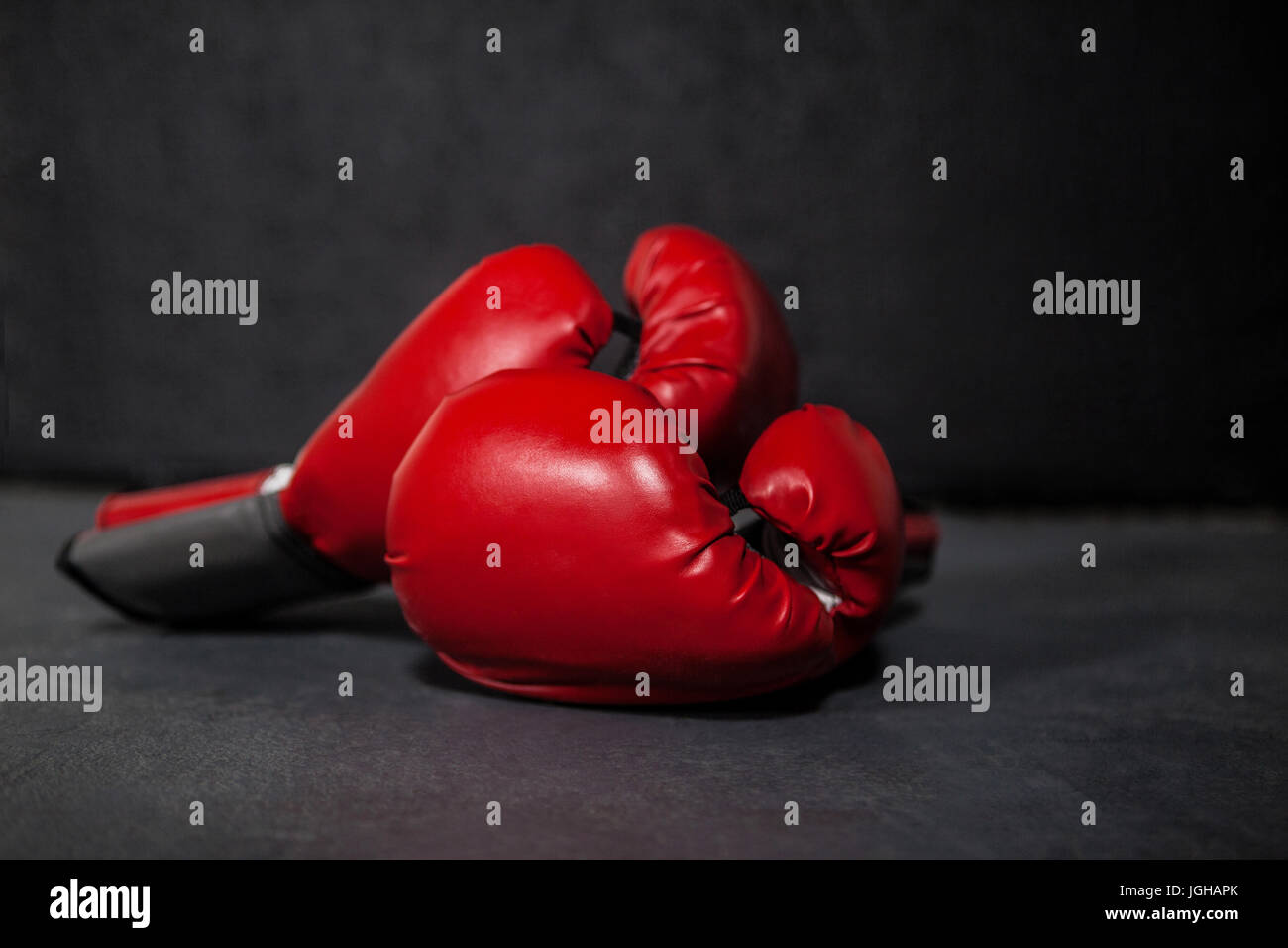 Hanging up boxing gloves hi-res stock photography and images - Alamy
