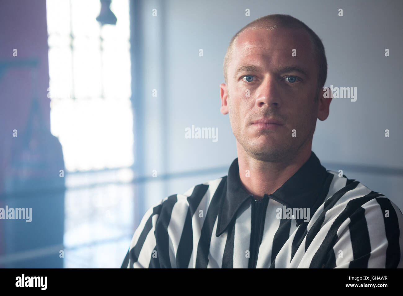 Referee standing smiling side by side confidence hi-res stock ...