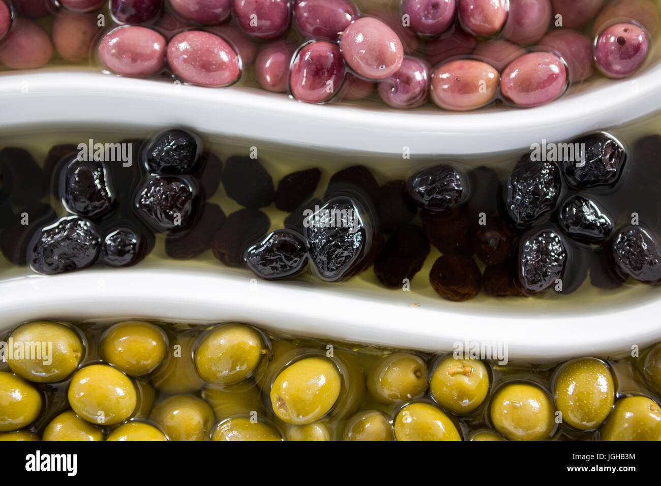 Close-up of various pickled olives in platter Stock Photo - Alamy