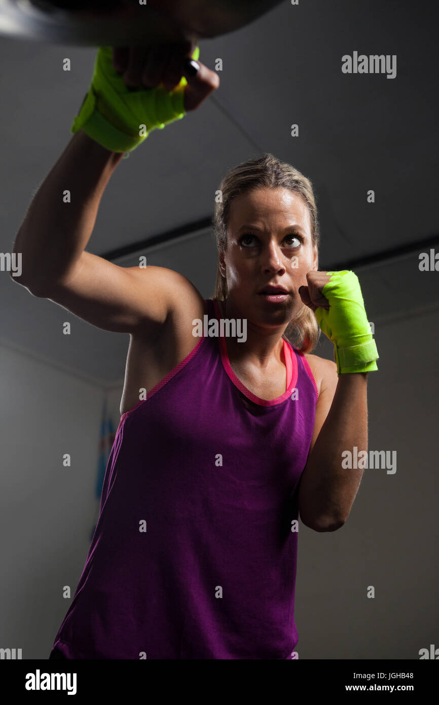 Practicing female boxing trainee hi-res stock photography and images ...