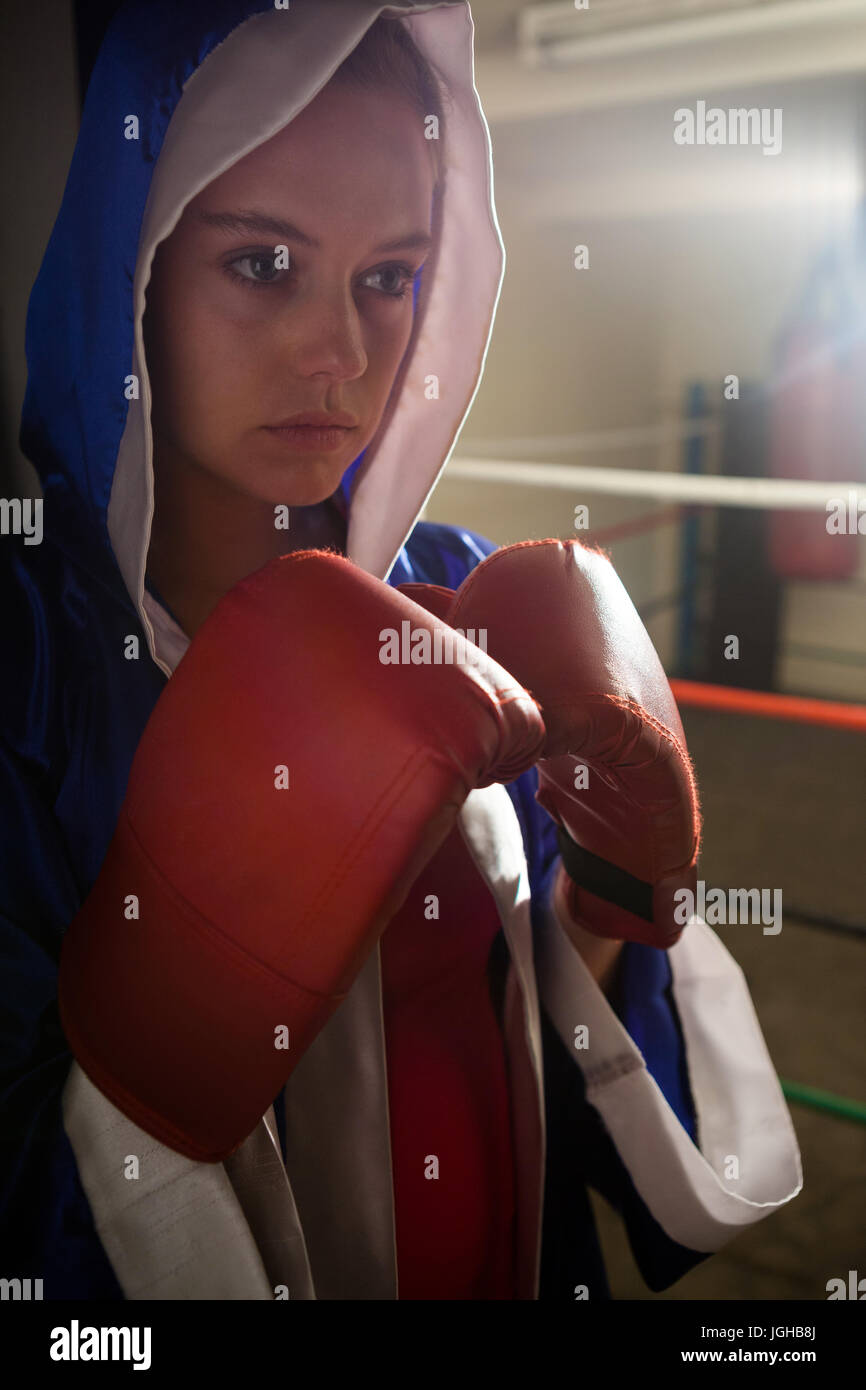 Beautiful woman practicing boxing in fitness studio Stock Photo - Alamy
