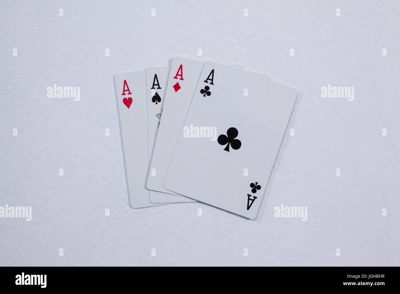Close-up of playing cards arranged on white background Stock Photo - Alamy