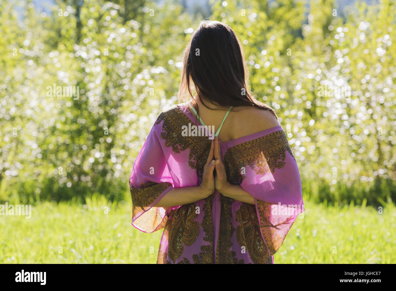 Reverse prayer pose hi-res stock photography and images - Alamy