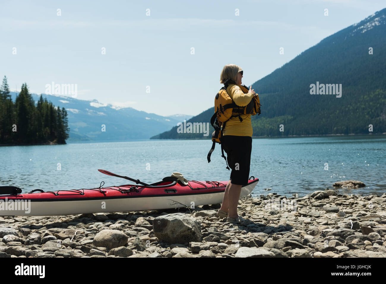 Woman wearing life jacket hi-res stock photography and images - Alamy
