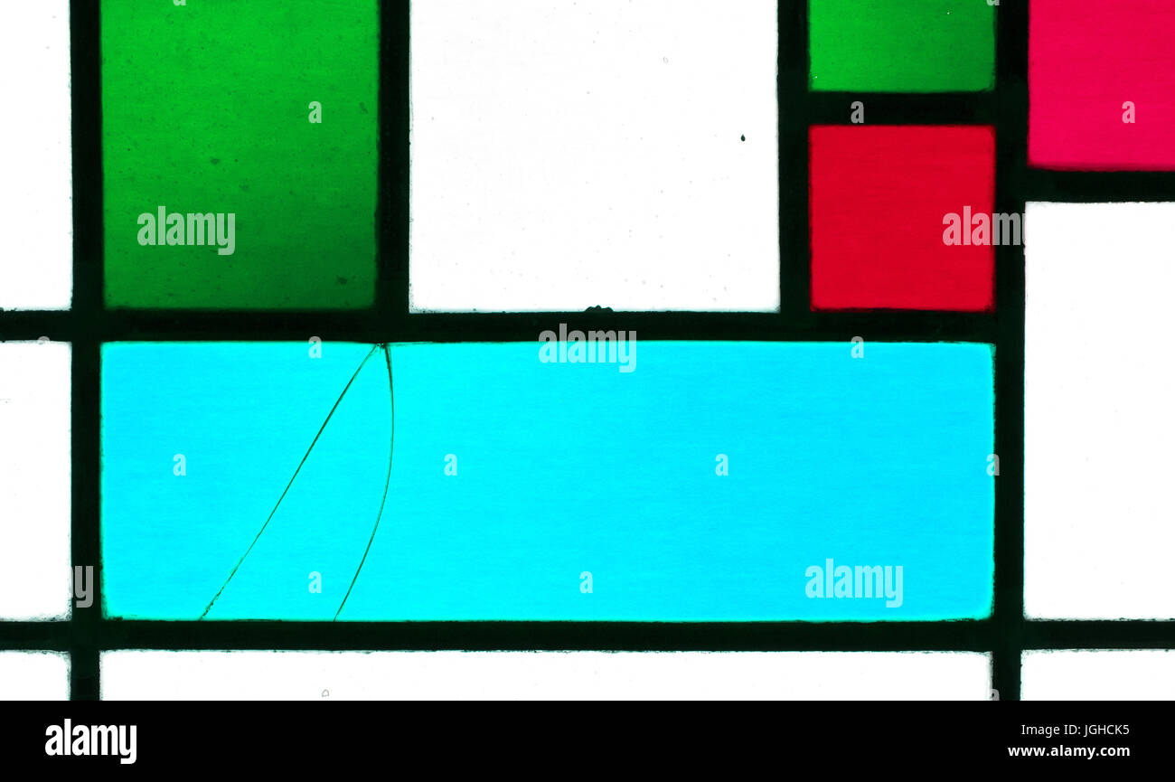 Image of a multicolored stained glass window with irregular block ...