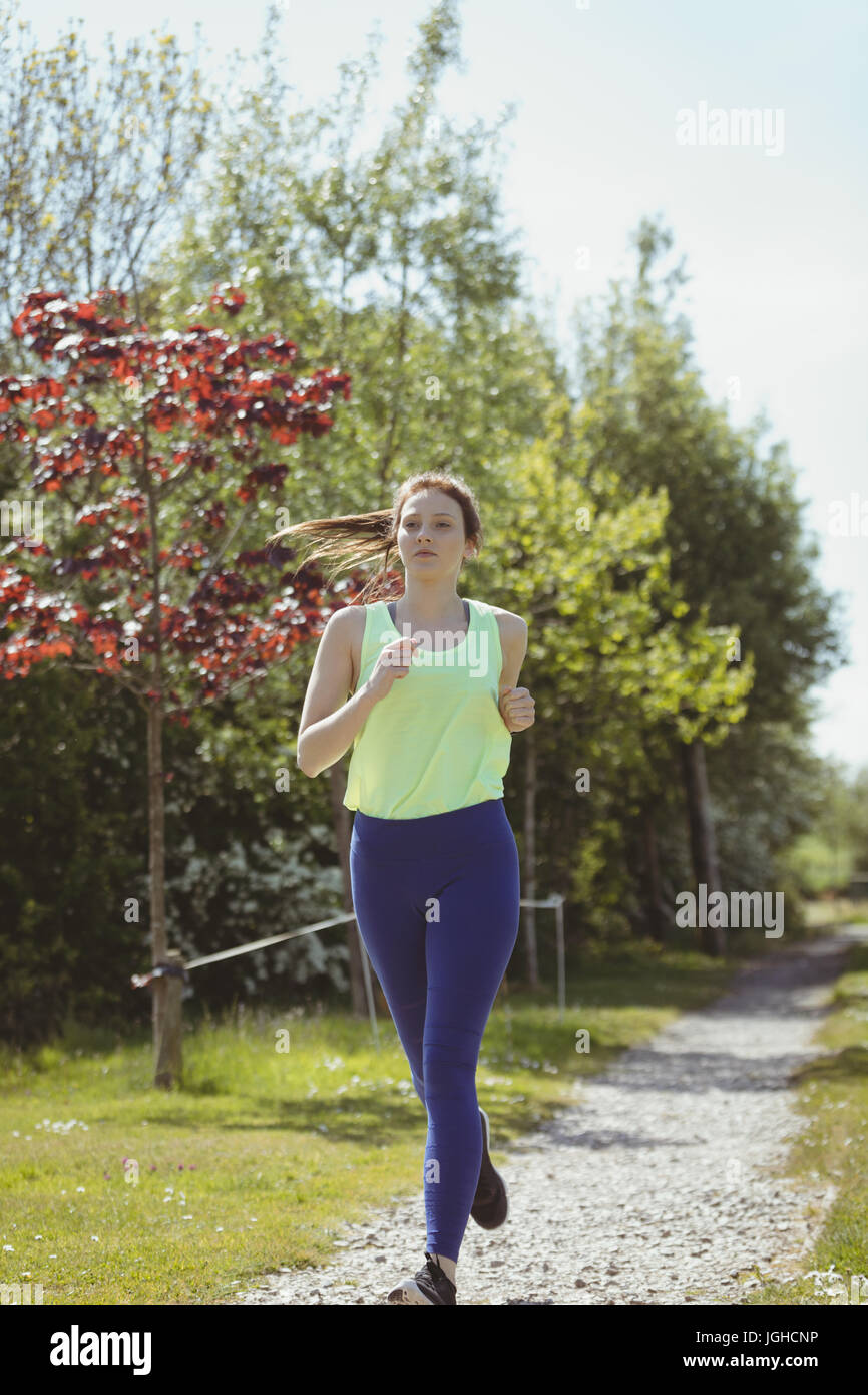 Female athlete jogging training stadium hi-res stock photography and ...