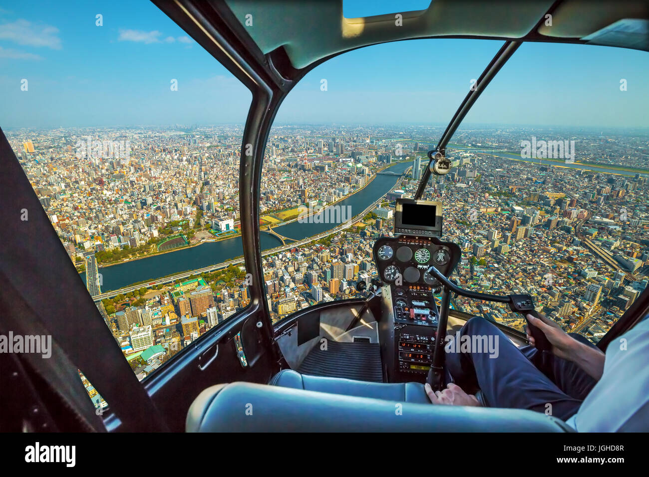 Helicopter on Tokyo skyline Stock Photo - Alamy