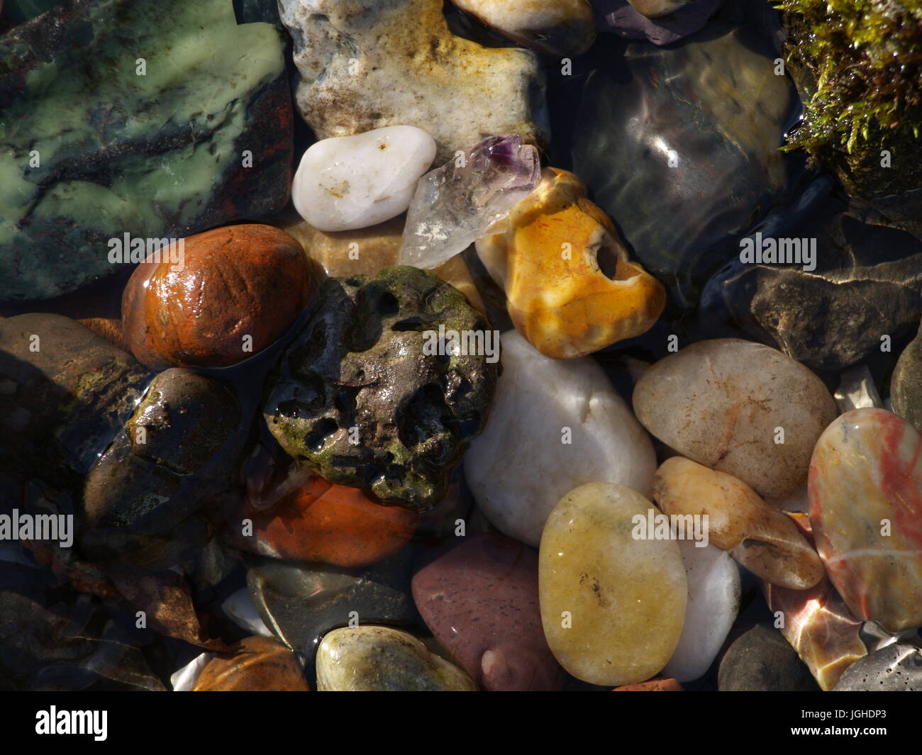 pebbles in a stream Stock Photo - Alamy