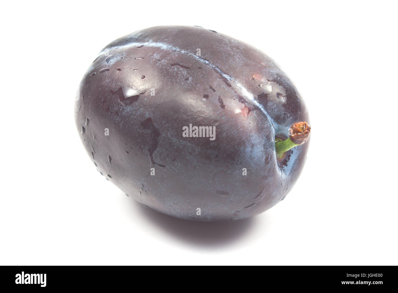 Ripe plum isolated on white Stock Photo - Alamy